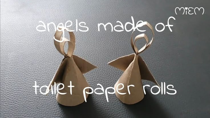 An Origami Angel Made Of Toilet Paper Rolls With The Words Angels Made Of