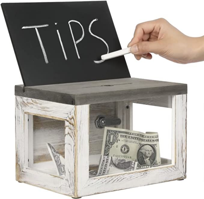 a hand holding a chalkboard with the word tips written on it in front ... a hand holding a chalkboard with the word tips written on it in front ...