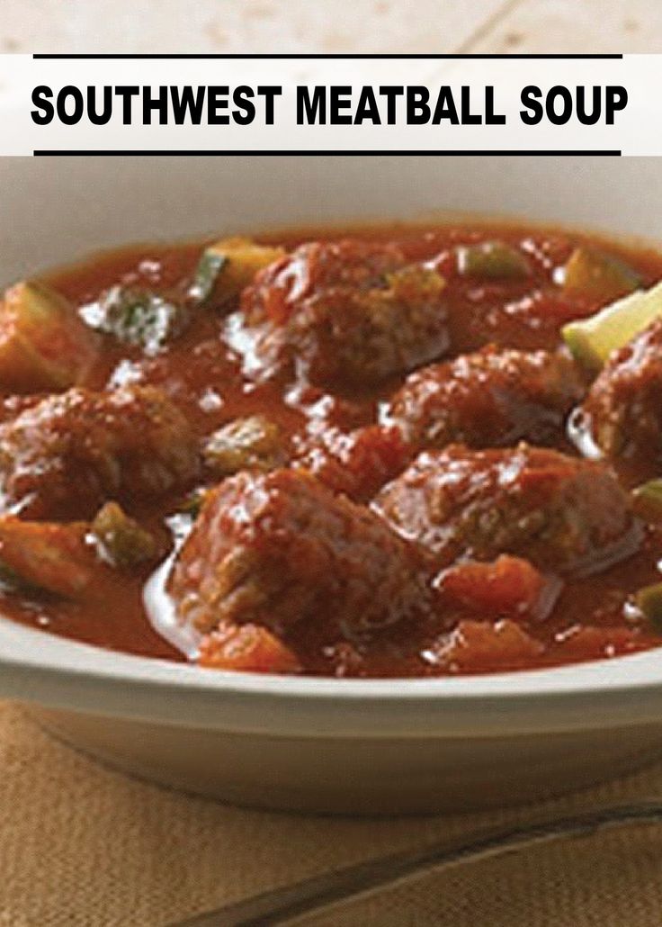A Bowl Of Meatball Soup With A Lemon Wedge On The Side And Words