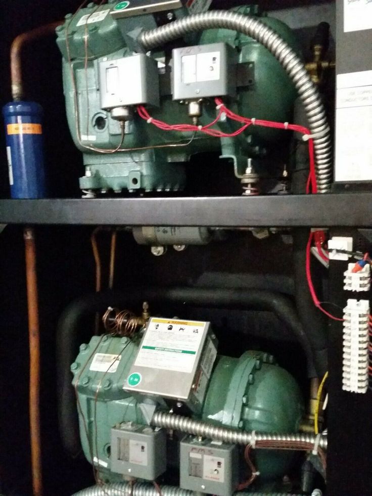 The Inside Of An Electrical Box With Wires And Other Equipment On Its Sides
