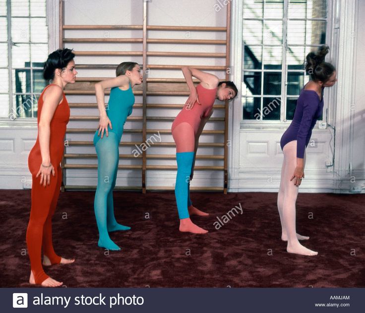 Download This Stock Image 1970 1970s 4 Women Group Pastel Leotards Tights Leg Warmers Warming