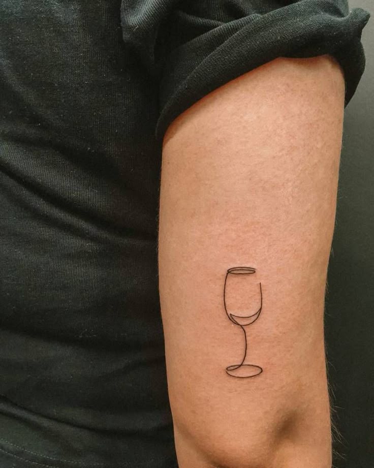 One Line Wine Glass Tattoo Located On The Tricep Minimalistiska Tatueringar Liten Tatuering