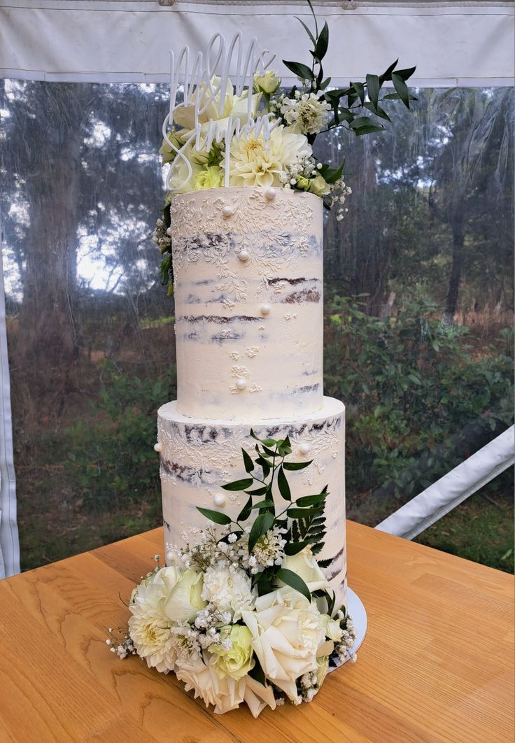 Semi Naked Wedding Cake With Buttercream Stencilling And Fresh Flowers Wedding Cake Pearls