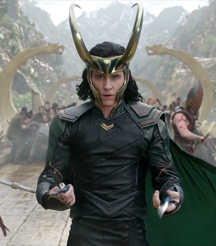 Loki In Avengers The Dark World With Other Characters Behind Him And