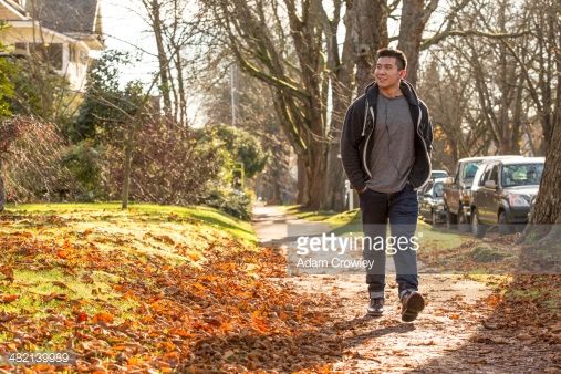 Mixed Race Man Walking On Suburban Street Cash Safe Savings Account High Yield Savings Account