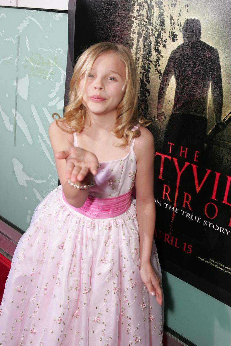 Actress Chloe Moretz Blows Kisses To The Photographers As She Poses At The World Premiere Of
