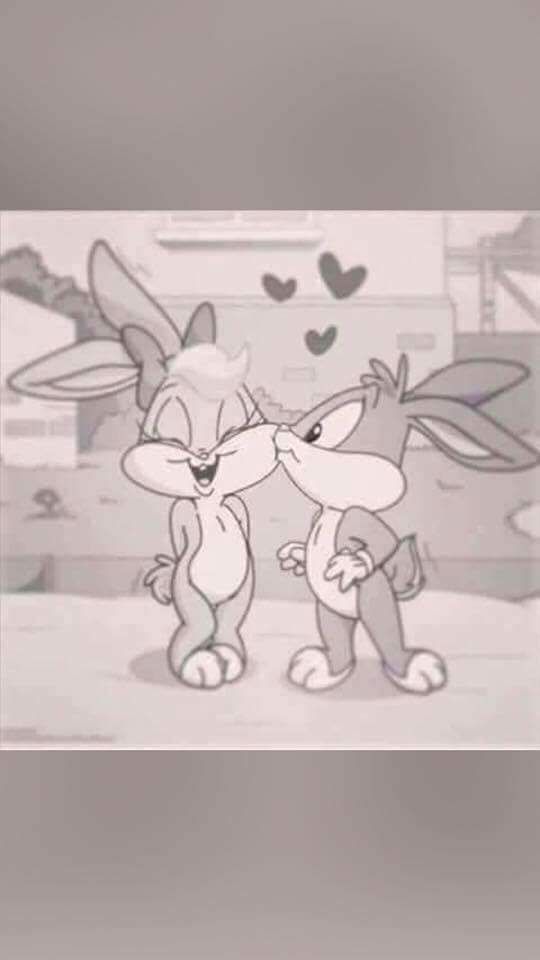Two Cartoon Characters Are Standing Next To Each Other In Front Of A Wall With Hearts On It