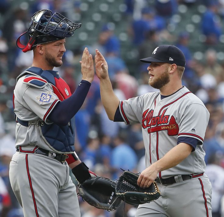 Atlanta Braves Aj Minter Right And Tyler Flowers Left Celebrate The Teams 6 5 Win Over