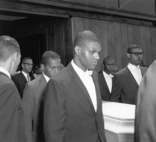 Malcolm X And Pallbearers Carrying Casket At Funeral Of Ronald Stokes 1962 Library Exhibits