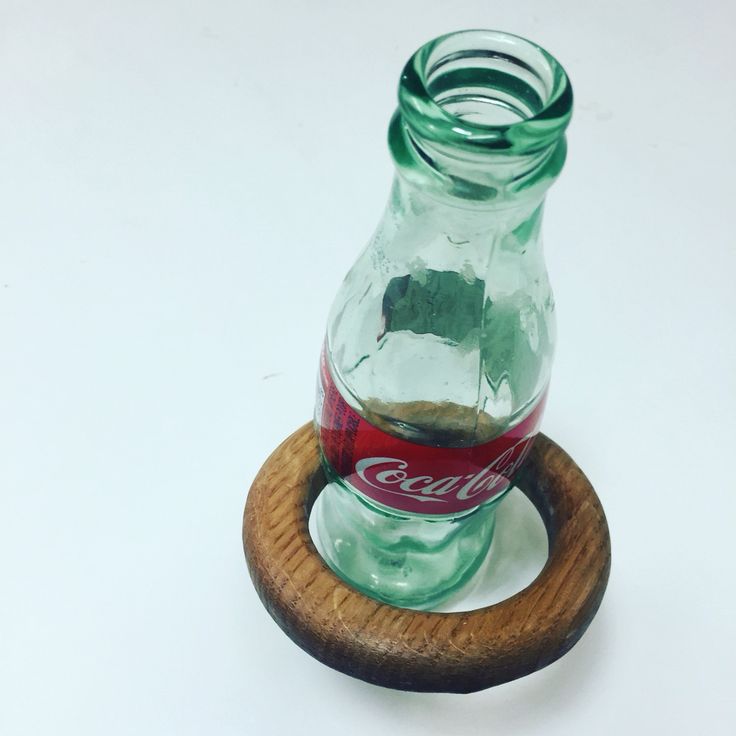 Impossible wood ring through glass bottle. | Glass bottles, Woodworking ... Impossible wood ring through glass bottle. | Glass bottles, Woodworking ...