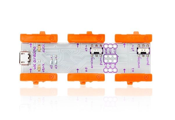 Two Orange And White Pieces Of Electronic Equipment
