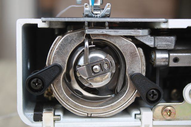 How To Adjust The Hook Timing On Sewing Machines Ehow Sewing Machine Repair Sewing Machine