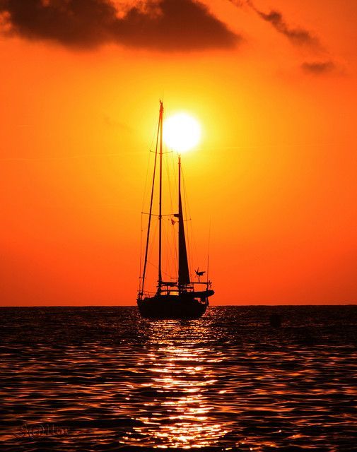 Sailboat On Ocean At Orange Sunset Sailing Boat Beautiful Sunset