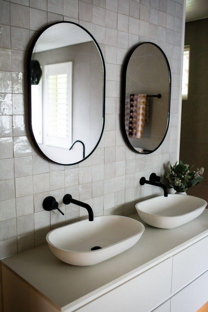 Oval mirrors help create a variation to the structural shapes of ... Oval mirrors help create a variation to the structural shapes of ...