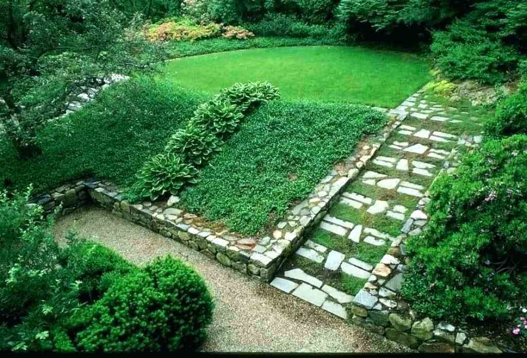 Landscape Slope Ideas Sloped Backyard Ideas Sloped Backyard With Shrubs And Stone Border