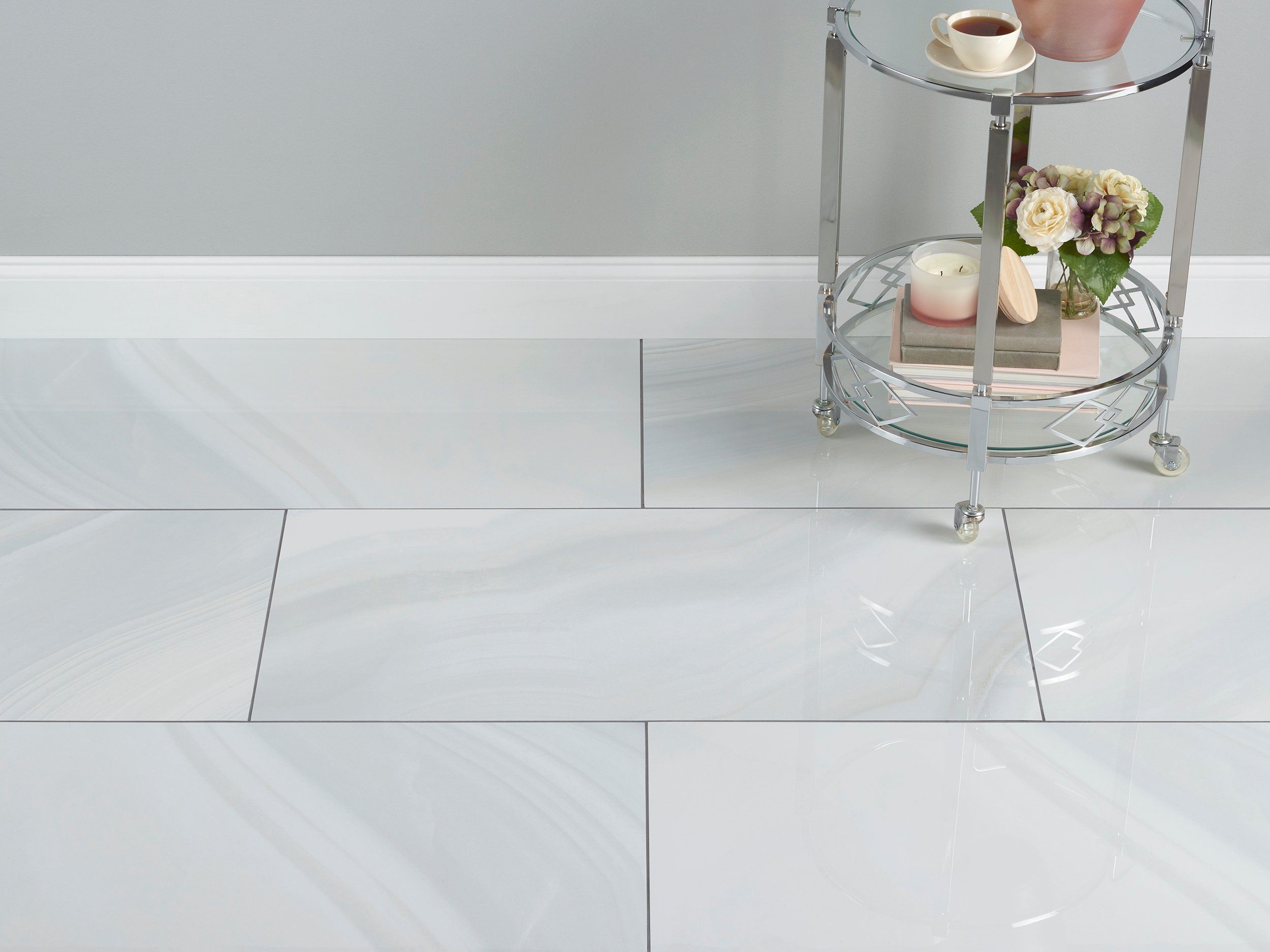 This White Montevino Onyx Polished Porcelain Tile Is 19 X 39 With