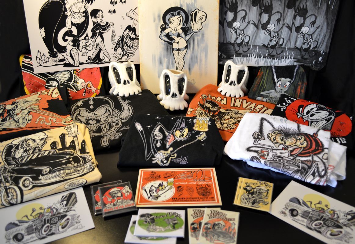 Various Items Are Displayed On A Table With Black And White Images In The Background Including
