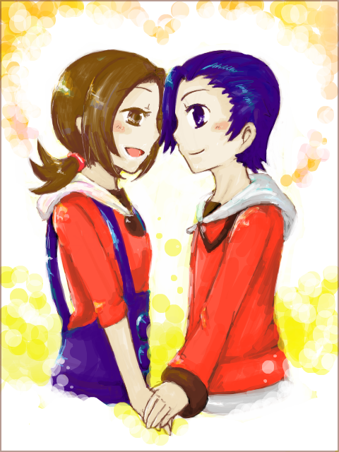 Two People Are Sitting Next To Each Other And One Is Holding The Others Hand