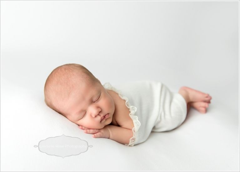 newborn - girl - ruffle wrap - side lying - fingers - Rose Photography ... newborn - girl - ruffle wrap - side lying - fingers - Rose Photography ...